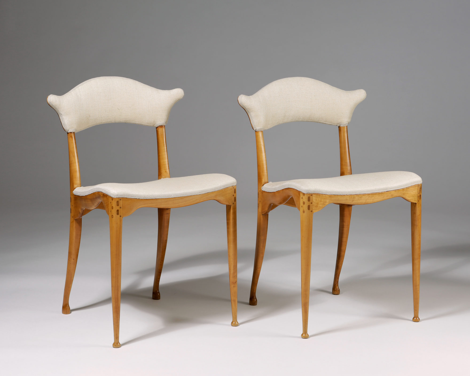 Two pierced back chairs designed by Peder Moos, Denmark. 1949. — Modernity