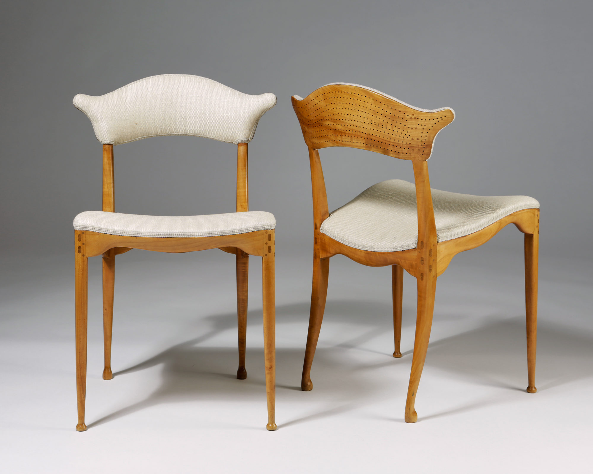 Two pierced back chairs designed by Peder Moos, Denmark. 1949. — Modernity