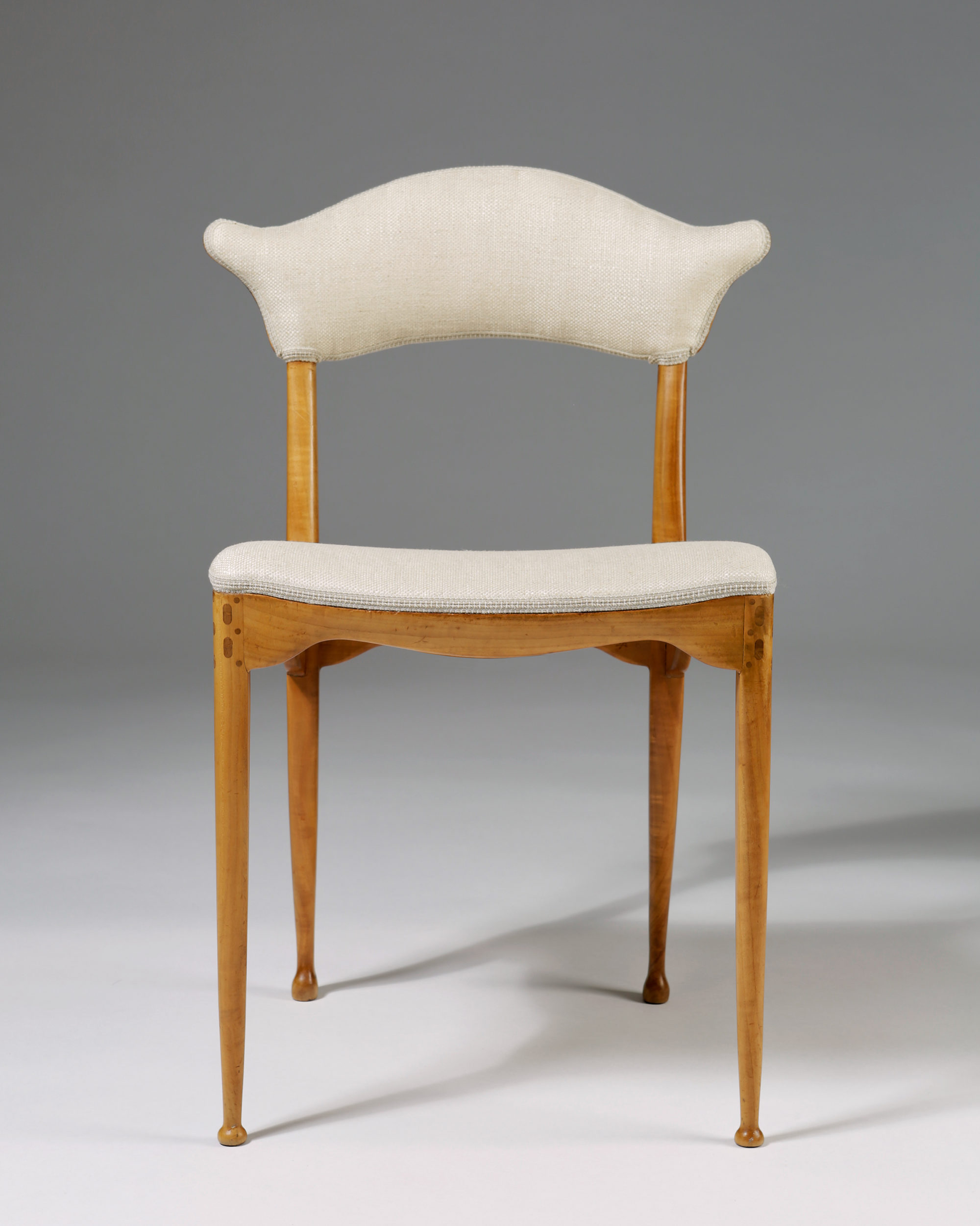 Two pierced back chairs designed by Peder Moos, Denmark. 1949. — Modernity