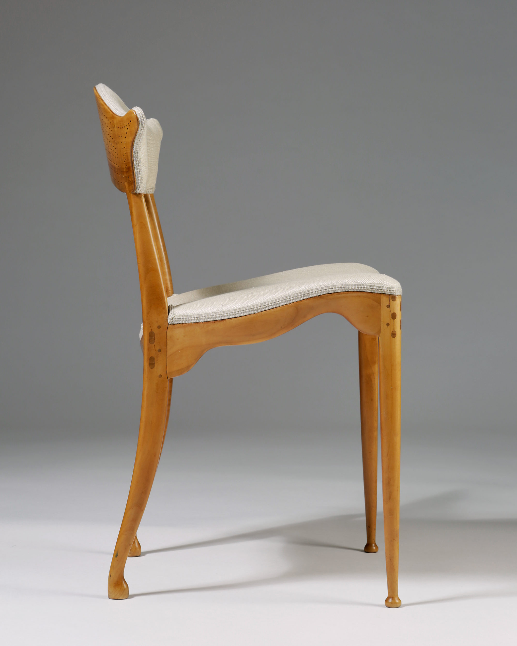 Two pierced back chairs designed by Peder Moos, Denmark. 1949. — Modernity