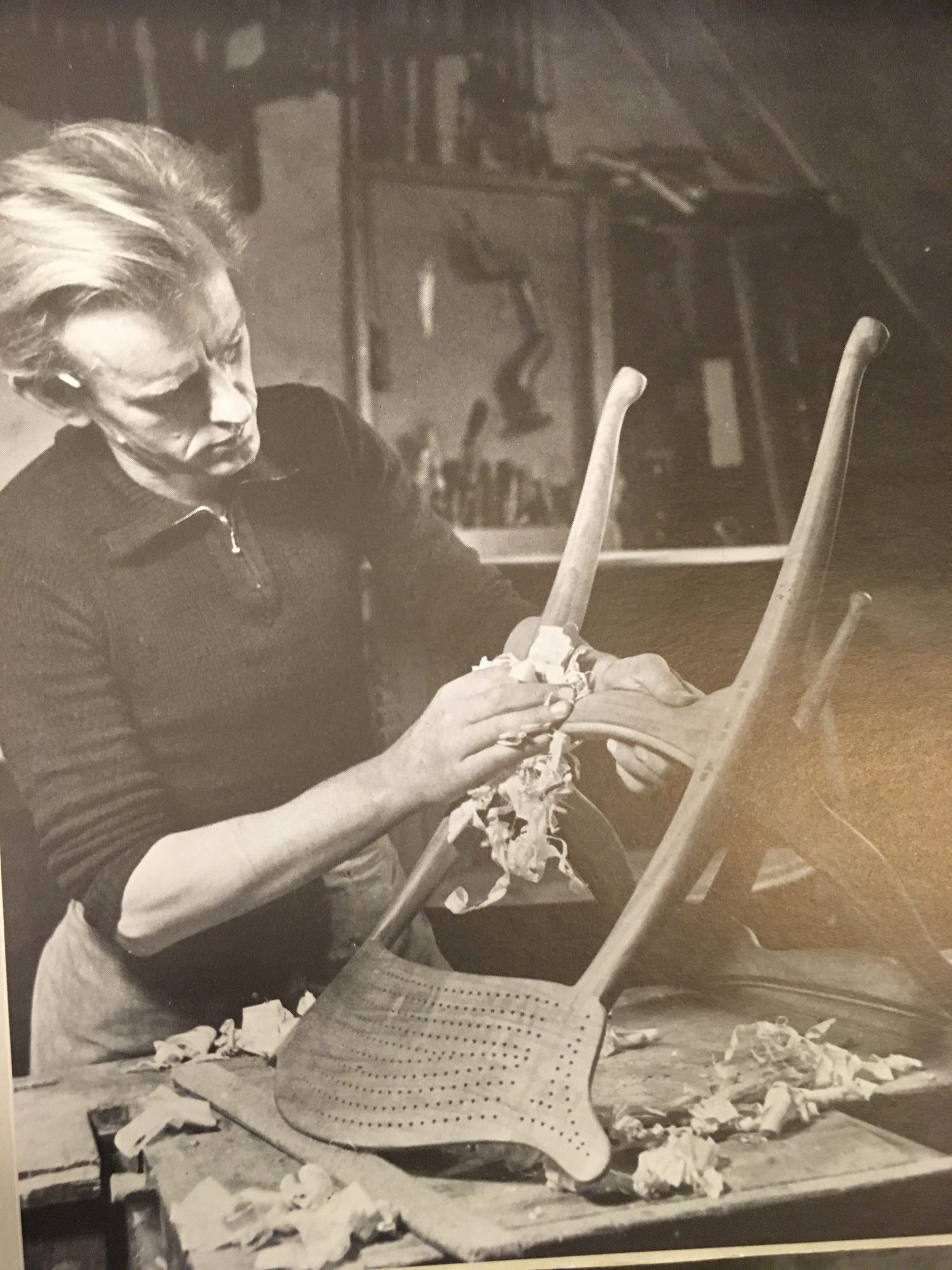 Peder Moos in his workshop, working on one the chairs below